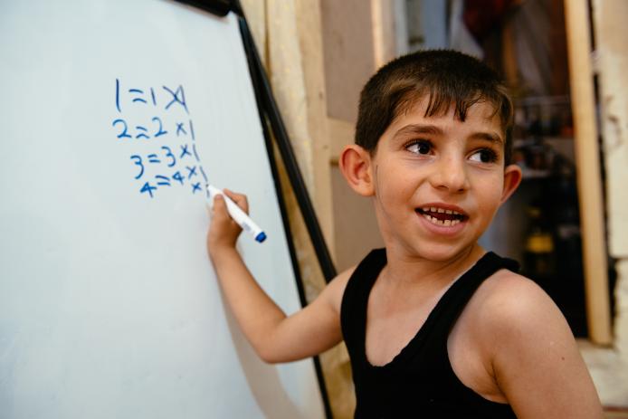Syrian dad determined to keep refugee kids learning | Mercy Corps